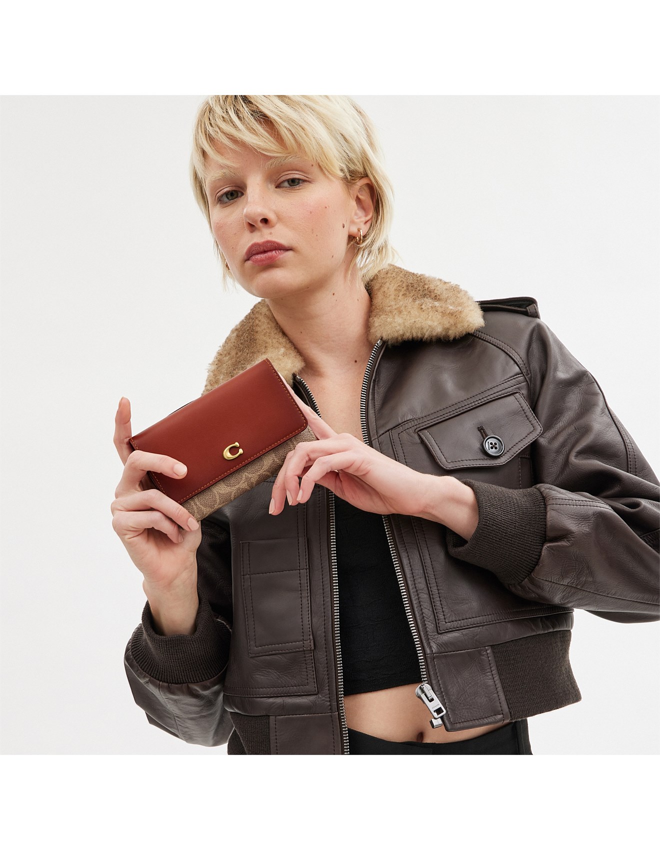 Coach Essential Medium Flap Wallet In Signature Canvas | David Jones